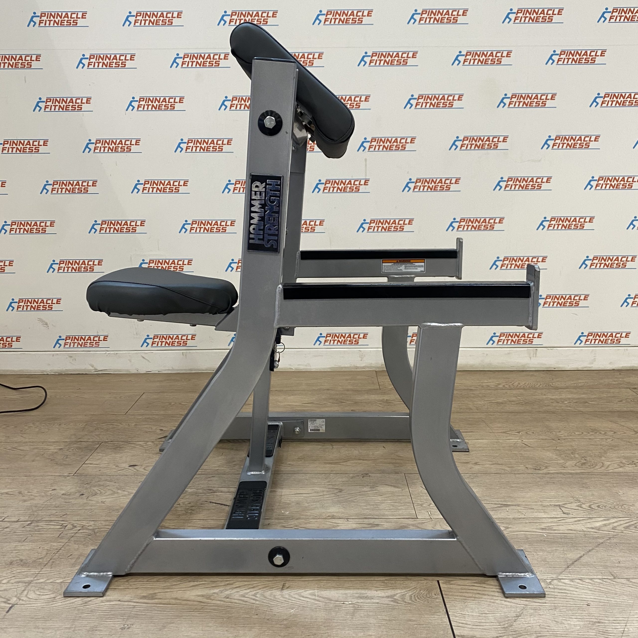 Hammer Strength Seated Arm Curl - Pinnacle Fitness