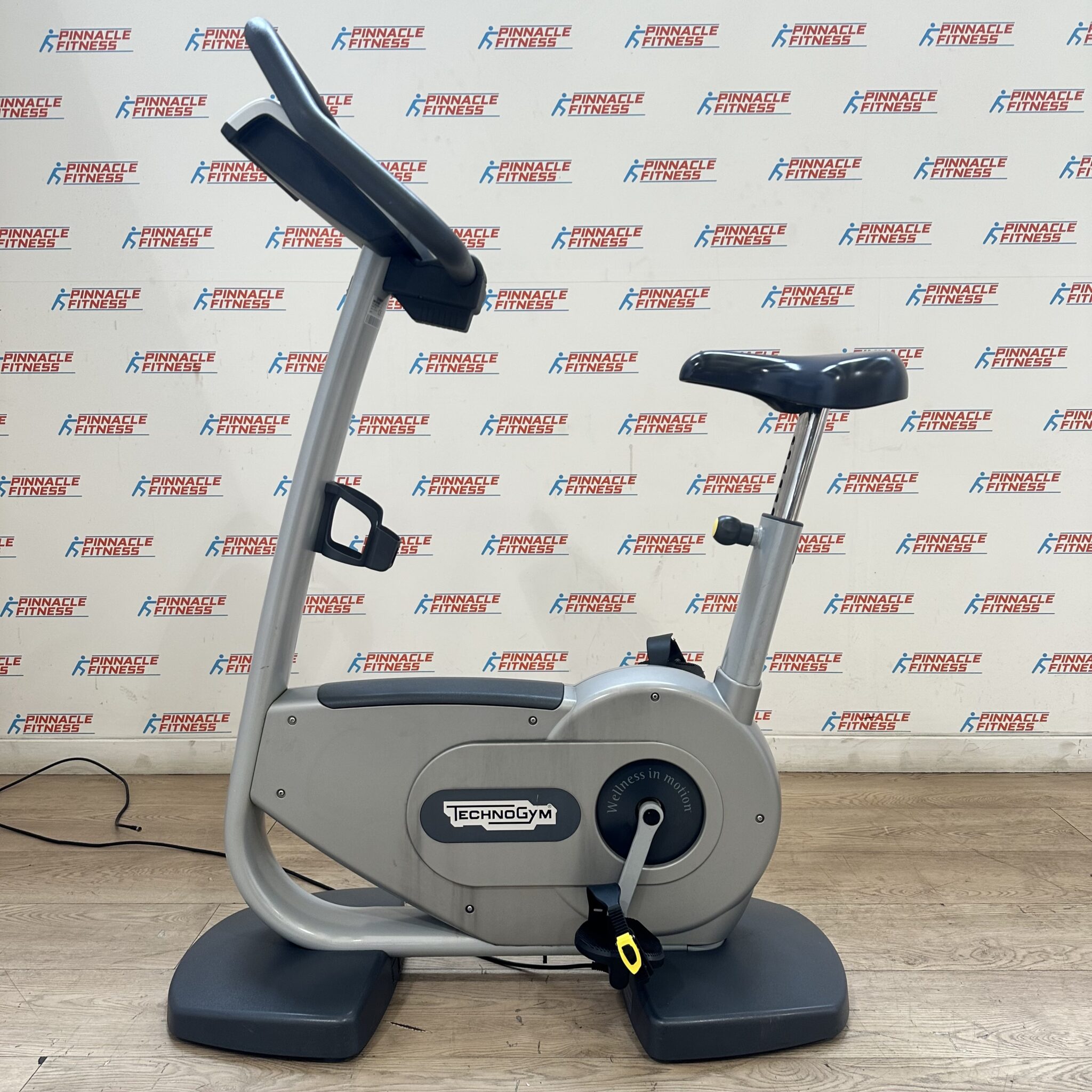 Technogym Excite 700 LED Upright Bike - Pinnacle Fitness